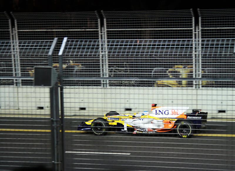 Formula 1 Car Speeding at the Night Race. Editorial Photo - Image of ...