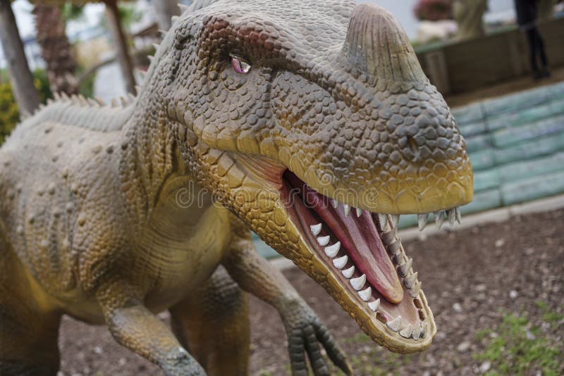Ferocious raptor dinosaur stock photo. Image of paleontology - 261634200