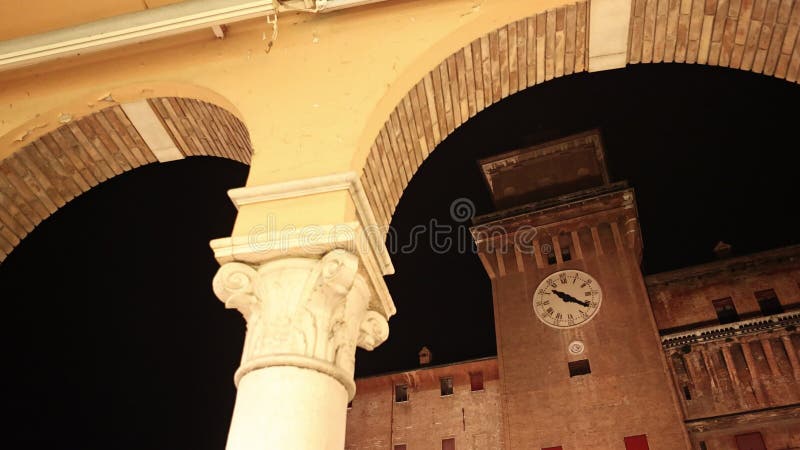 Ferrara castle clock night stock video. Video of clock - 275060171
