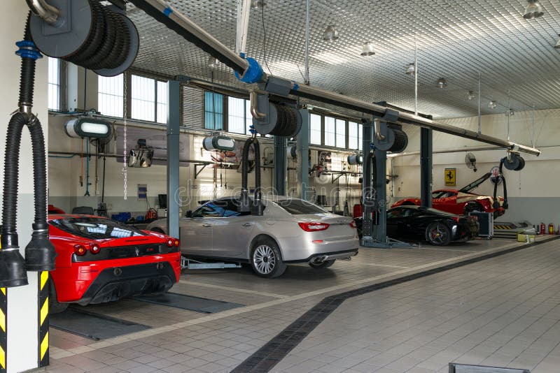 Ferrari car repair service editorial stock image. Image of laptop ...