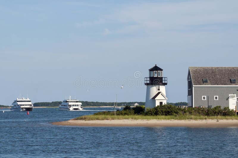 Ferries Pass by Lighthouse on Cape Cod Stock Image - Image of beacon ...