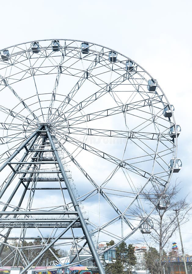 Ferris or Observation Wheel Over a Blue Sky Stock Image - Image of park ...