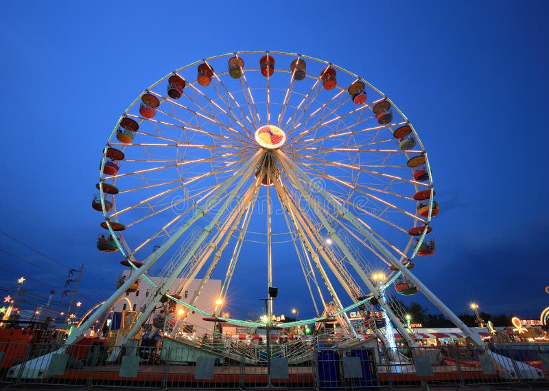 Ferris Wheel at Amusement Park Stock Image - Image of spin ...