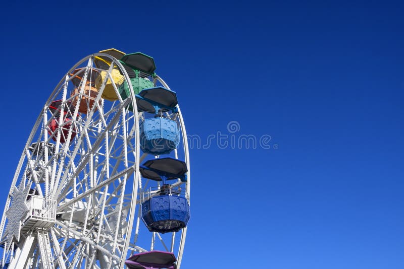 Ferris wheel on blue stock photo. Image of fairground - 165645414