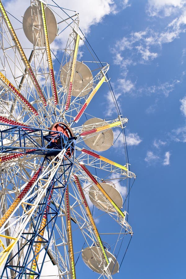 Ferris Wheel on a blue sky stock photo. Image of play - 19032548
