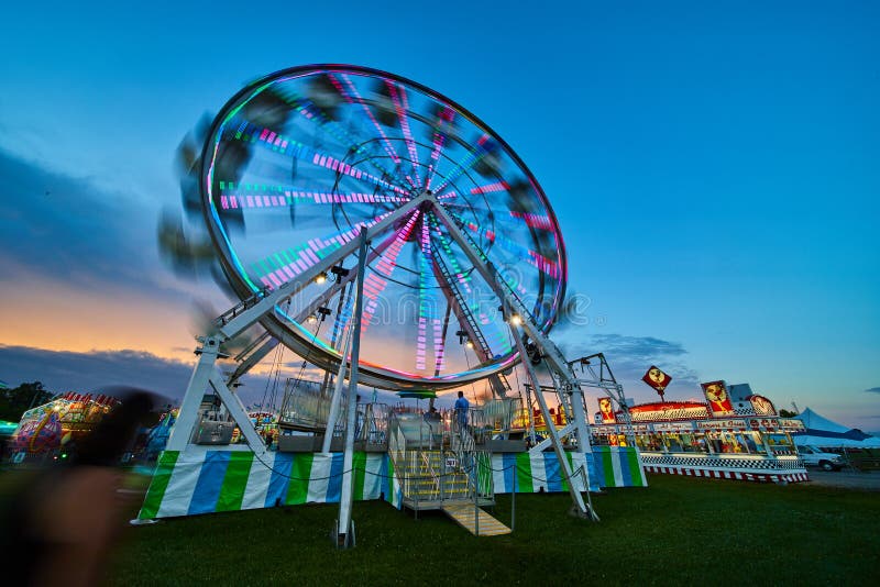 Ferris Wheel Blurred at Carnival County Fair in America Editorial ...