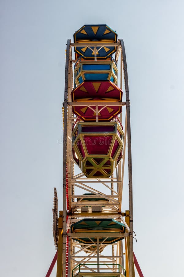 Ferris Wheel with Booths on Blue Sky Background Stock Photo - Image of ...