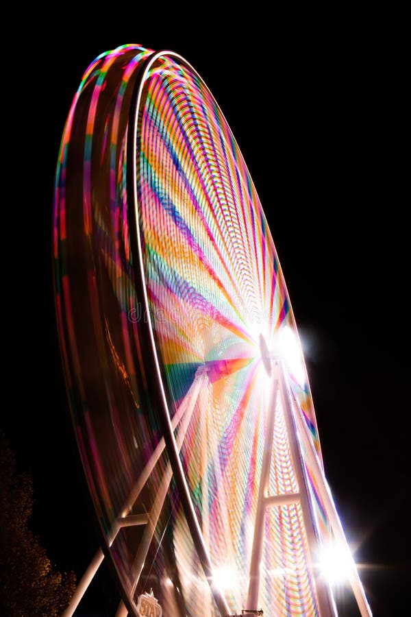 A Ferris Wheel in Motion with Long Exposure Stock Photo - Image of ...