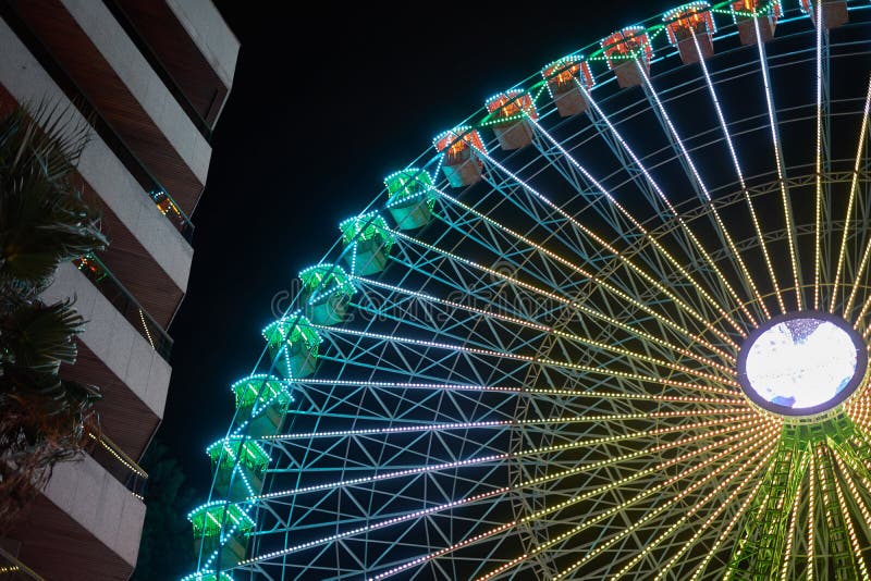 Ferris Wheel Near a Building in Vigo Stock Image - Image of dusk ...