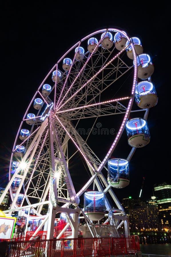 Ferris wheel at night stock photo. Image of light, attraction - 73757818
