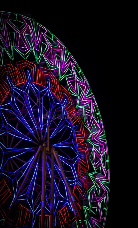 The Ferris Wheel at Night is Full of Colorful Lights Stock Photo ...
