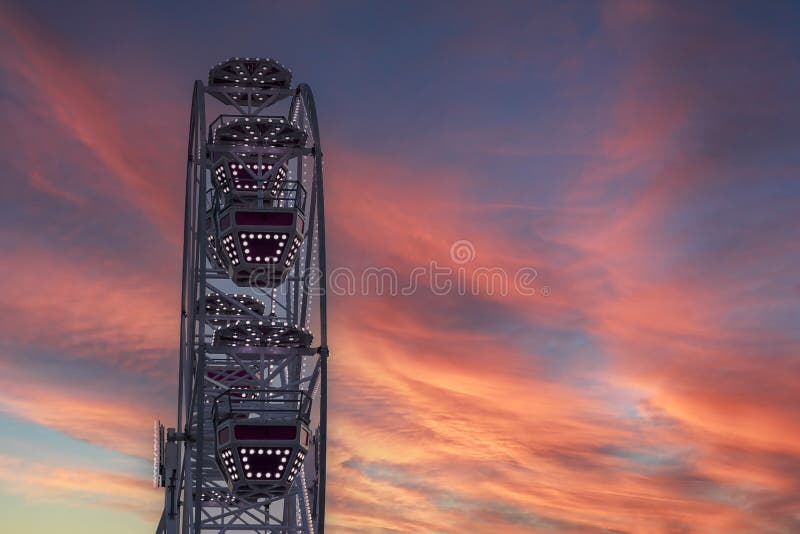 Ferris Wheel - Observation Seats. in the Background is a Sky with ...
