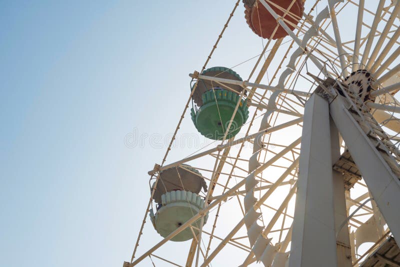 Ferris Wheel Over Blue Sky. Ferris Wheel in an Amusement Park Stock ...