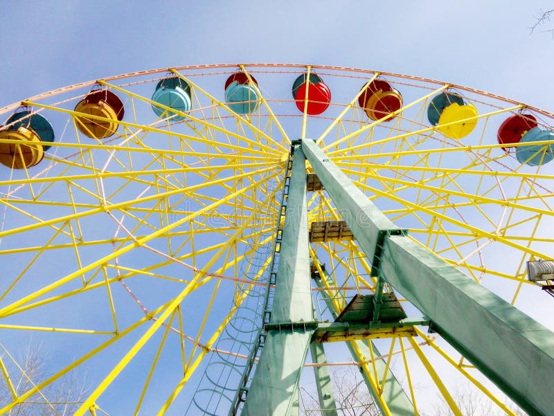 Ferris Wheel Over Blue Sky. City Park in the Spring Stock Photo - Image ...