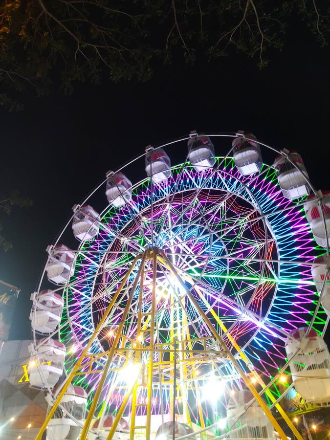 Ferris Wheel 5 stock image. Image of blurred, fast, multi - 385068243