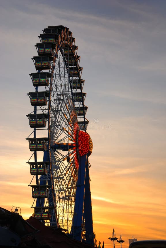 Ferris wheel at sunset editorial stock image. Image of ride - 3332234