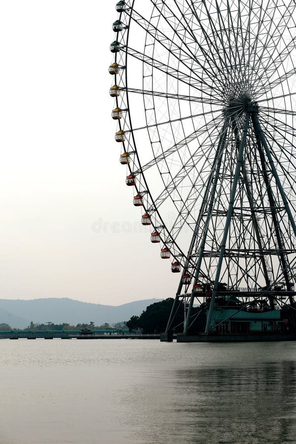 Ferris wheel on water stock photo. Image of city, asia - 7713514