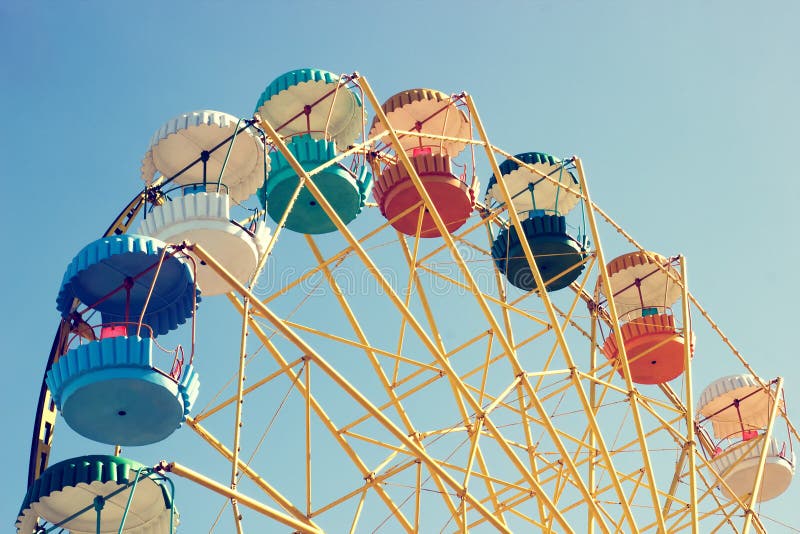 Ferris Wheel-yellow with Multi-colored Booths Stock Photo - Image of ...