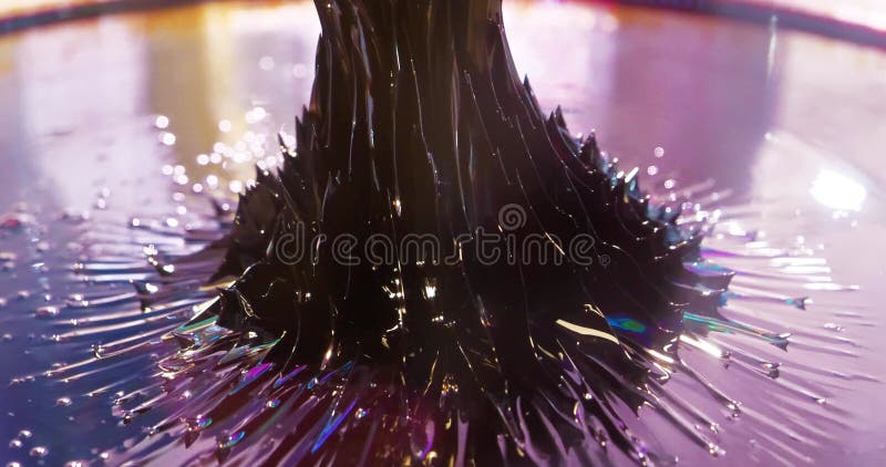 Ferromagnetic Fluid. Real Ferromagnetic Fluid in Action. Viscous ...
