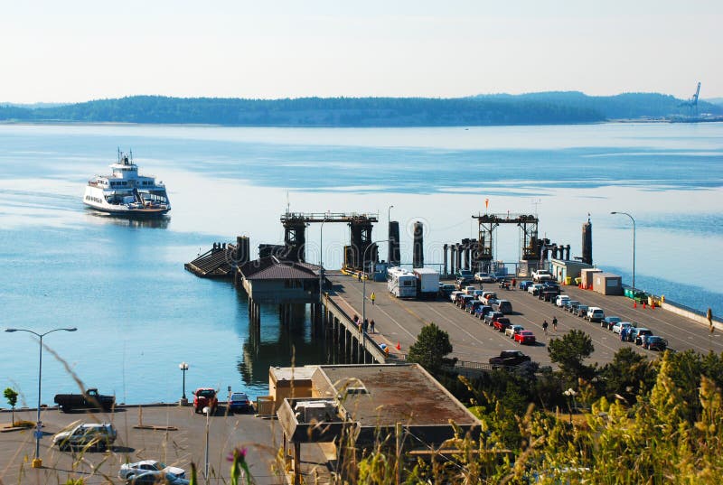 Ferry Arrives at the Dock stock image. Image of ferry - 10053755