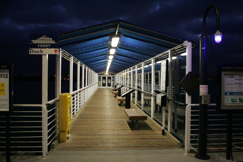 Ferry Jetty at Night stock photo. Image of bench, oakland - 1577290