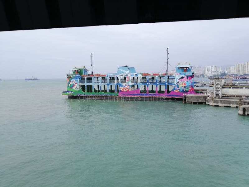 Ferry in penang jetty editorial photo. Image of jetty - 158026996