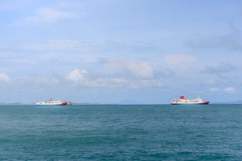 Ferry Sailing Across a Sunlit Horizon. Large Ferry Holding Position ...