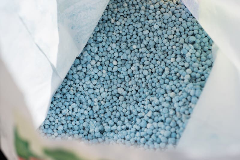 Fertilizer Blue Grain in the Bag Stock Photo - Image of accessories ...