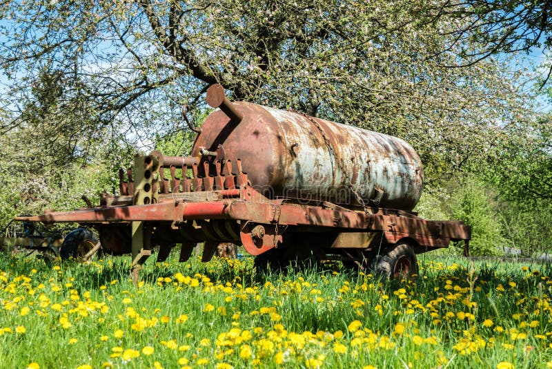 Fertilizer Trailer in a Meadow in Spring Stock Photo - Image of farm ...