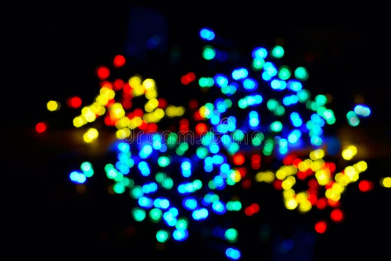 Festive Background with Coloutful De-focused Lights Against Black ...
