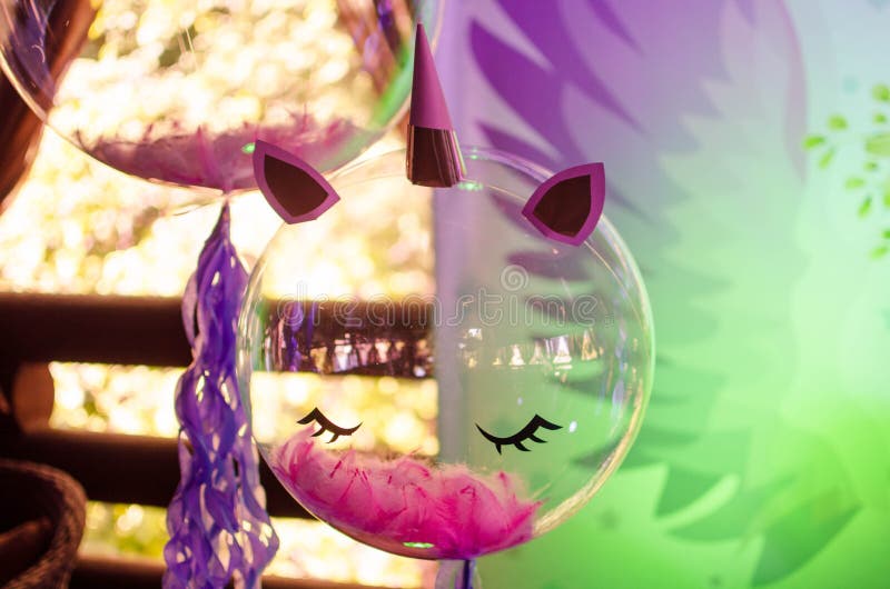 A Festive Ball with Feathers Inside in the Form of a Unicorn. Stock ...