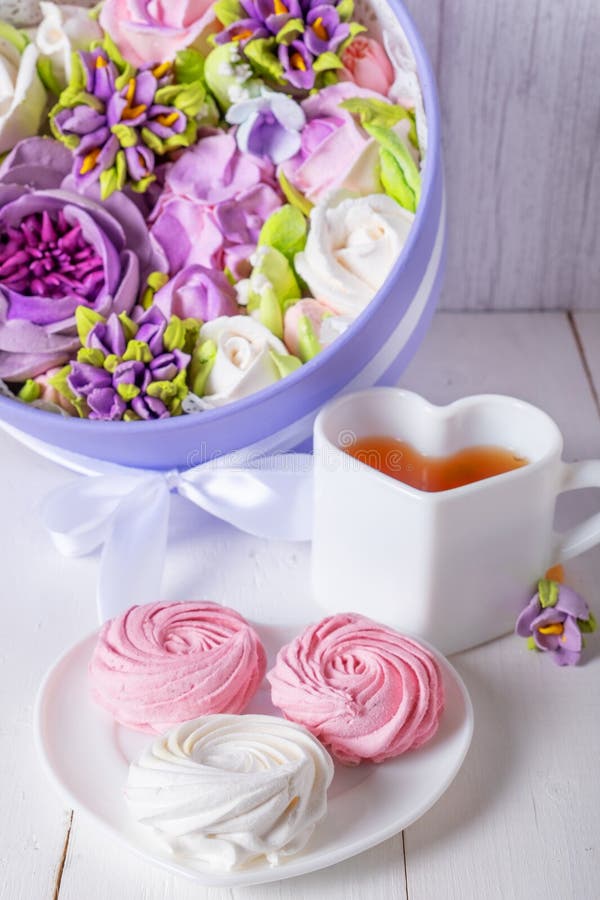 A Festive Breakfast of Pink and White Marshmallows, a Cup of Tea and a ...