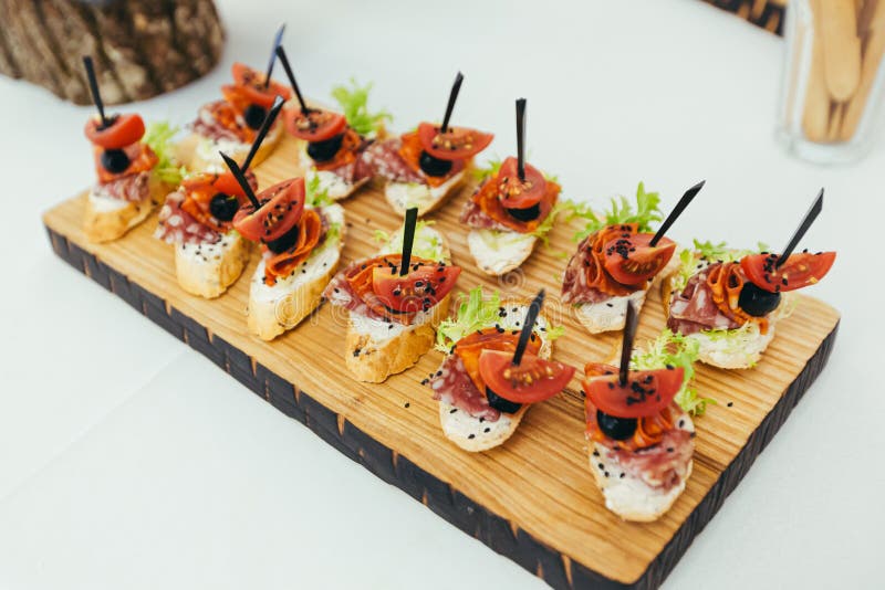 Festive Buffet Table with Various Snacks of Fish and Meat Stock Image ...