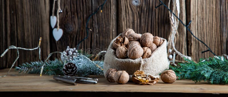 Festive Christmas Nuts Tumbling from a Burlap Bag Stock Photo - Image ...