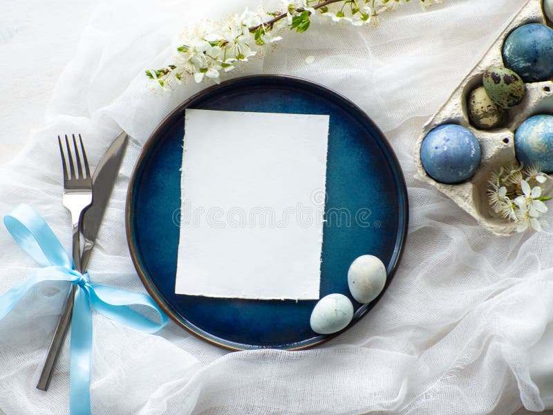 Festive Easter Table Setting with Eggs and Flowers on White Background ...