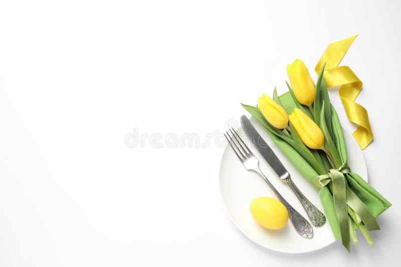 Festive Easter Table Setting with Painted Eggs on Wooden Background ...