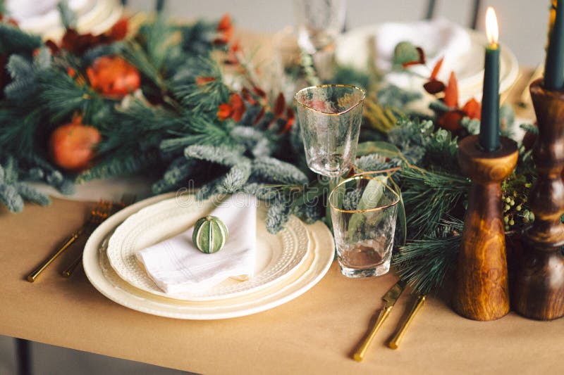 Festive and Elegant Christmas Dinner Setting with Ornate Golden-plated ...