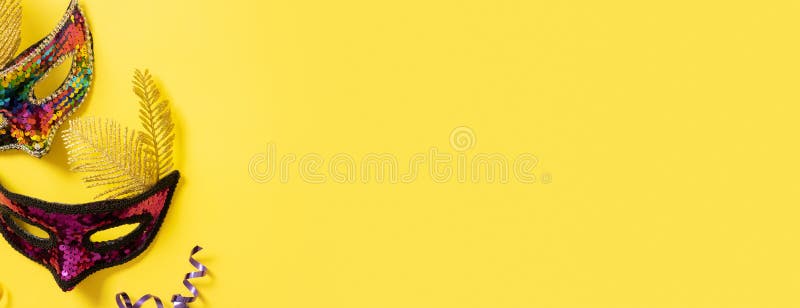Festive Face Mask for Carnival Celebration on Yellow Background. Copy ...
