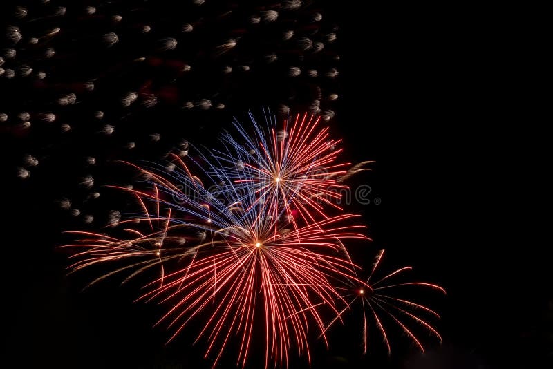 Festive Fireworks. Bright Beams of Exploding Pyrotechnics Against Black ...