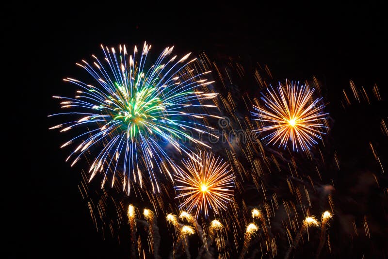 Festive Fireworks in the Shape of a Blue Flower and Gold Stars Stock ...
