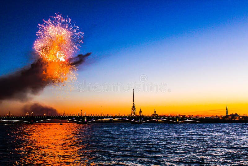 Festive Fireworks on the Waterfront at Sunset Stock Photo - Image of ...