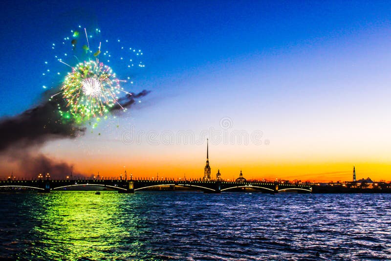 Festive Fireworks on the Waterfront at Sunset Stock Photo - Image of ...