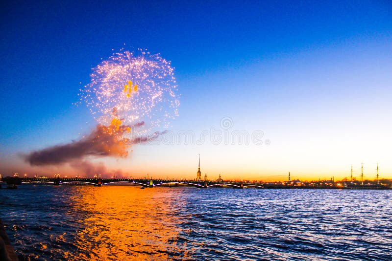 Festive Fireworks on the Waterfront at Sunset Stock Photo - Image of ...