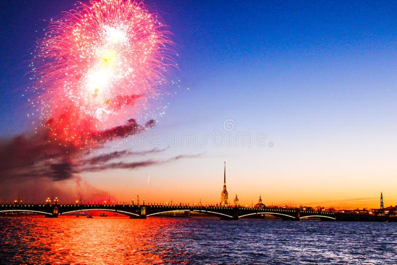 Festive Fireworks on the Waterfront at Sunset Stock Photo - Image of ...