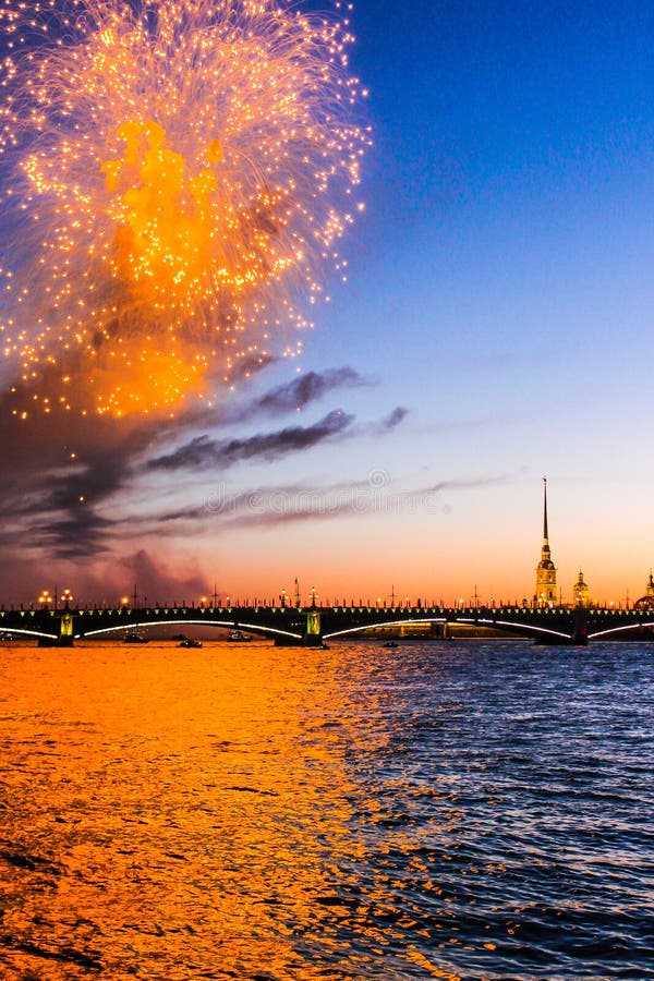 Festive Fireworks on the Waterfront at Sunset Stock Photo - Image of ...