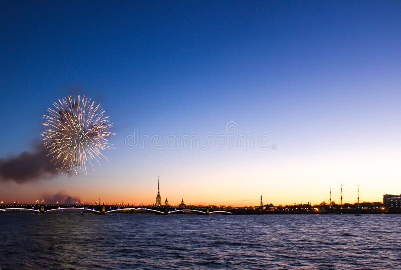 Festive Fireworks on the Waterfront at Sunset Stock Photo - Image of ...