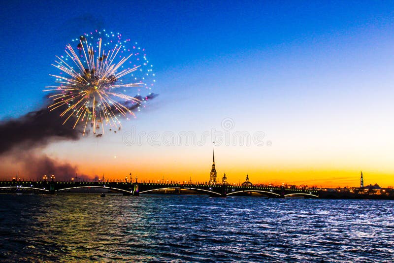 Festive Fireworks on the Waterfront at Sunset Stock Photo - Image of ...