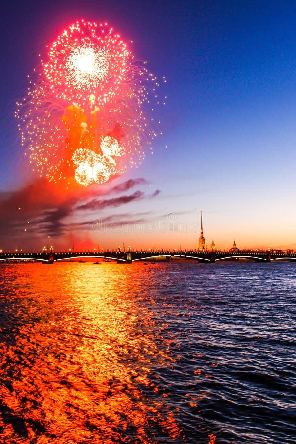 Festive Fireworks on the Waterfront at Sunset Stock Photo - Image of ...