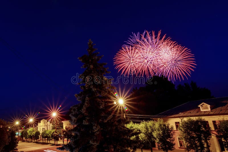 Festive Multicolored Fireworks Over City at Night Stock Photo - Image ...