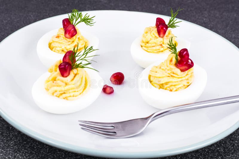 Festive snack stuffed eggs stock image. Image of garnish - 87107031